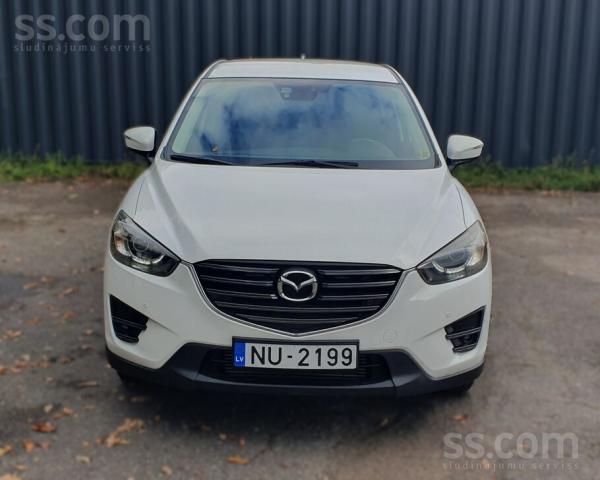 White Mazda CX-5 2015 in Riga, with an engine capacity of 2.20 L and mileage of 240 thousand km for 7950 €, photo 7 on AUTOMOTO.COM.LV