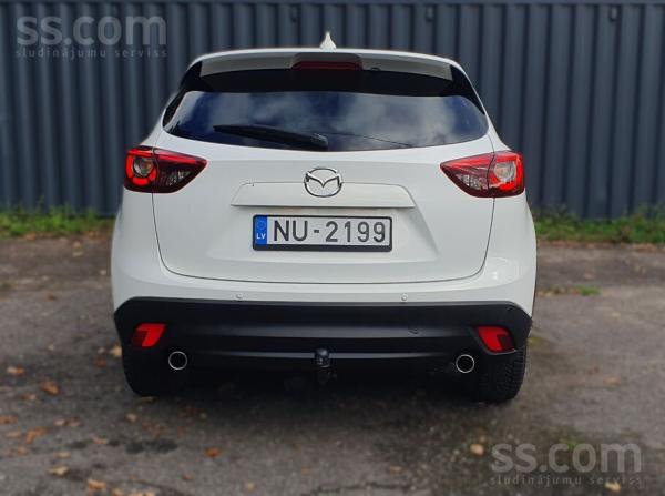 White Mazda CX-5 2015 in Riga, with an engine capacity of 2.20 L and mileage of 240 thousand km for 7950 €, photo 8 on AUTOMOTO.COM.LV