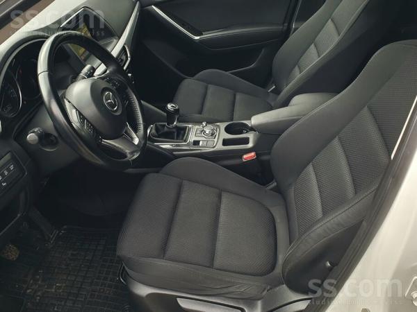 White Mazda CX-5 2015 in Riga, with an engine capacity of 2.20 L and mileage of 240 thousand km for 7950 €, photo 9 on AUTOMOTO.COM.LV
