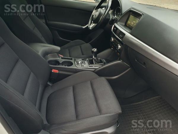 White Mazda CX-5 2015 in Riga, with an engine capacity of 2.20 L and mileage of 240 thousand km for 7950 €, photo 11 on AUTOMOTO.COM.LV