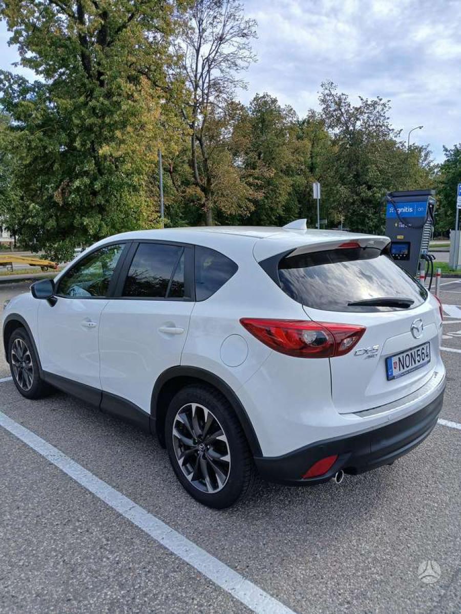 White Mazda CX-5 2015 in Kaunas, with an engine capacity of 2.19 L and mileage of 179 thousand km for 9700 €, photo 6 on AUTOMOTO.COM.LV