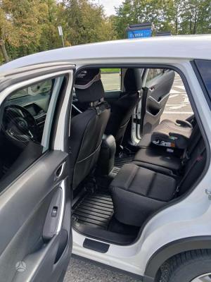 White Mazda CX-5 2015 in Kaunas, with an engine capacity of 2.19 L and mileage of 179 thousand km for 9700 €, photo 19 on AUTOMOTO.COM.LV