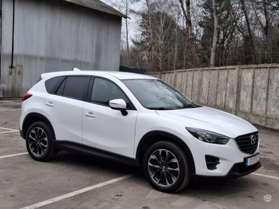 White Mazda CX-5 2016 in Vilnius, with an engine capacity of 2.19 L and mileage of 217 thousand km for 10000 €, photo 12 on AUTOMOTO.COM.LV