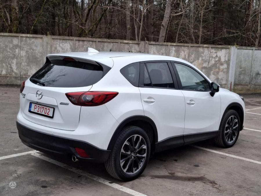 White Mazda CX-5 2016 in Vilnius, with an engine capacity of 2.19 L and mileage of 217 thousand km for 10000 €, photo 13 on AUTOMOTO.COM.LV