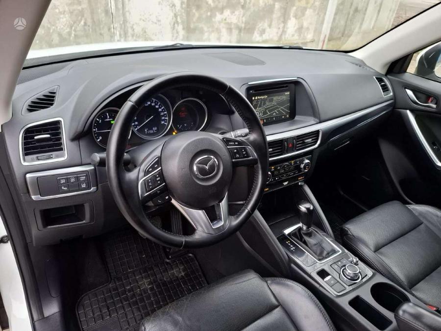 White Mazda CX-5 2016 in Vilnius, with an engine capacity of 2.19 L and mileage of 217 thousand km for 10000 €, photo 10 on AUTOMOTO.COM.LV