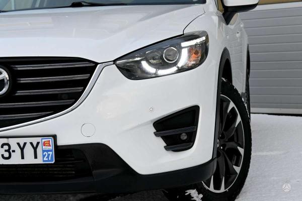 White Mazda CX-5 2016 in Kretinga, with an engine capacity of 2.19 L and mileage of 181 thousand km for 8999 €, photo 5 on AUTOMOTO.COM.LV