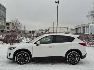 White Mazda CX-5 2016 in Vilnius, with an engine capacity of 2.19 L and mileage of 217 thousand km for 10200 €, photo 4 on AUTOMOTO.COM.LV