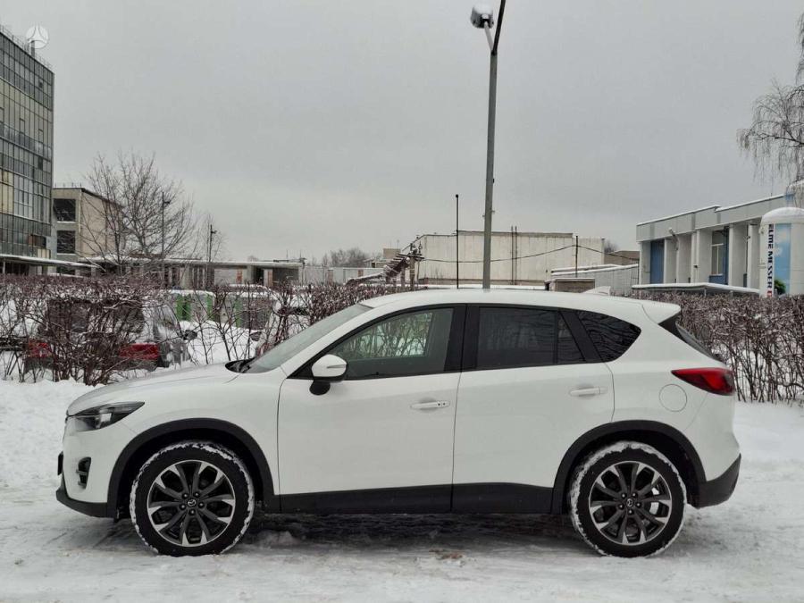 White Mazda CX-5 2016 in Vilnius, with an engine capacity of 2.19 L and mileage of 217 thousand km for 10200 €, photo 4 on AUTOMOTO.COM.LV