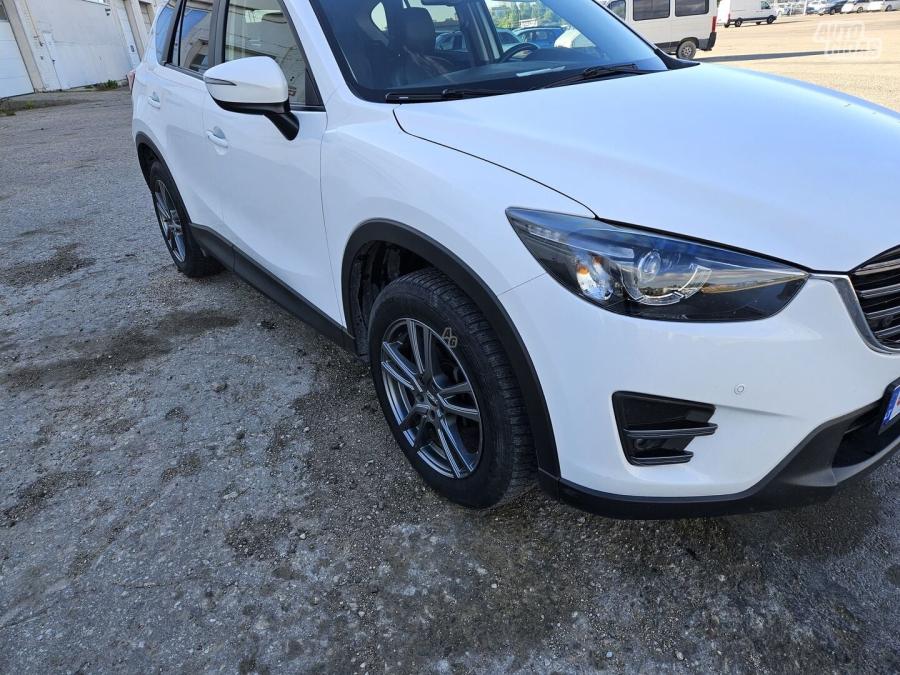 White Mazda CX-5 2016 in Panevezys, with an engine capacity of 2.20 L and mileage of 186 thousand km for 7900 €, photo 3 on AUTOMOTO.COM.LV