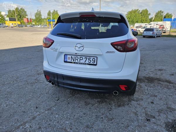 White Mazda CX-5 2016 in Panevezys, with an engine capacity of 2.20 L and mileage of 186 thousand km for 7900 €, photo 5 on AUTOMOTO.COM.LV