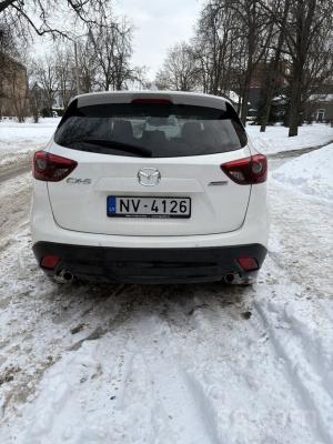 White Mazda CX-5 2016 in Riga, with an engine capacity of 2.20 L and mileage of 245 thousand km for 8450 €, photo 4 on AUTOMOTO.COM.LV