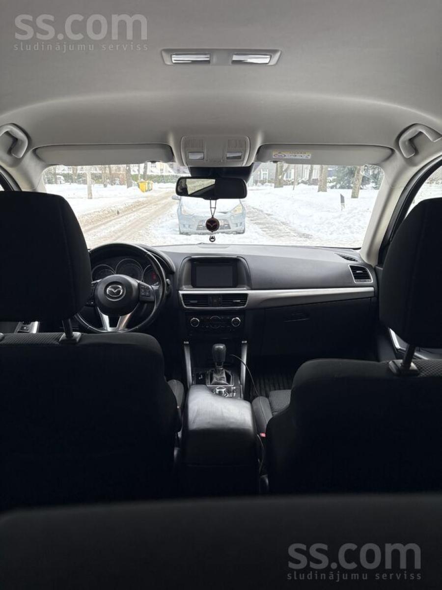 White Mazda CX-5 2016 in Riga, with an engine capacity of 2.20 L and mileage of 245 thousand km for 8450 €, photo 5 on AUTOMOTO.COM.LV