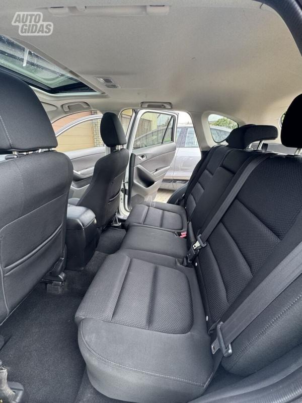 White Mazda CX-5 2016 in Klaipeda, with an engine capacity of 2.50 L and mileage of 201 thousand km for 9000 €, photo 11 on AUTOMOTO.COM.LV