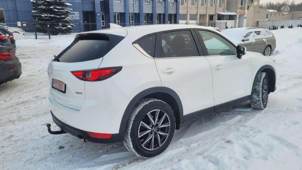 White Mazda CX-5 2017 in Siauliai, with an engine capacity of 2.19 L and mileage of 229 thousand km for 13400 €, photo 6 on AUTOMOTO.COM.LV