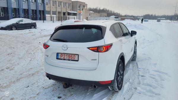 White Mazda CX-5 2017 in Siauliai, with an engine capacity of 2.19 L and mileage of 229 thousand km for 13400 €, photo 7 on AUTOMOTO.COM.LV