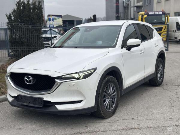 White Mazda CX-5 2017 in Marijampole, with an engine capacity of 2.19 L and mileage of 225 thousand km for 9250 €, photo 6 on AUTOMOTO.COM.LV
