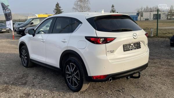 White Mazda CX-5 2017 in Marijampole, with an engine capacity of 2.20 L and mileage of 231 thousand km for 13850 €, photo 5 on AUTOMOTO.COM.LV