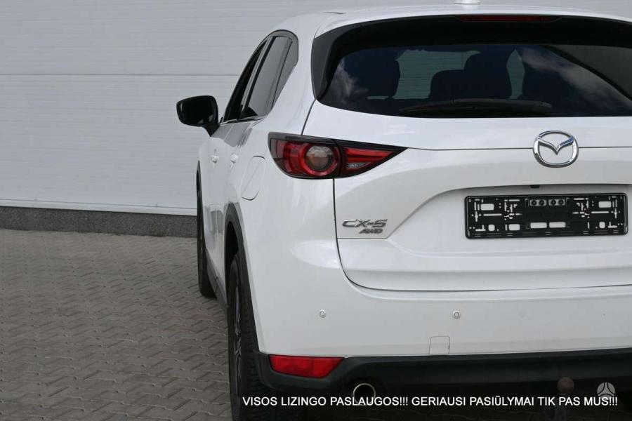 White Mazda CX-5 2017 in Kretinga, with an engine capacity of 2.19 L and mileage of 202 thousand km for 12799 €, photo 12 on AUTOMOTO.COM.LV