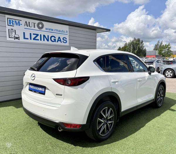 White Mazda CX-5 2018 in Panevezys, with an engine capacity of 2.19 L and mileage of 195 thousand km for 11300 €, photo 5 on AUTOMOTO.COM.LV