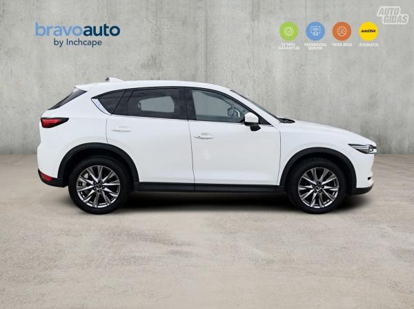 White Mazda CX-5 2019 in Kaunas, with an engine capacity of 2.00 L and mileage of 112 thousand km for 22471 €, photo 6 on AUTOMOTO.COM.LV