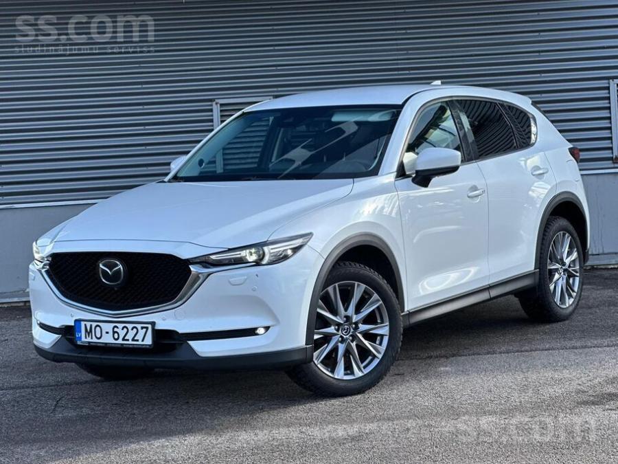 White Mazda CX-5 2020 in Riga, with an engine capacity of 2.00 L and mileage of 127 thousand km for 21450 €, photo 1 on AUTOMOTO.COM.LV