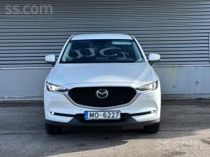 White Mazda CX-5 2020 in Riga, with an engine capacity of 2.00 L and mileage of 127 thousand km for 21450 €, photo 6 on AUTOMOTO.COM.LV