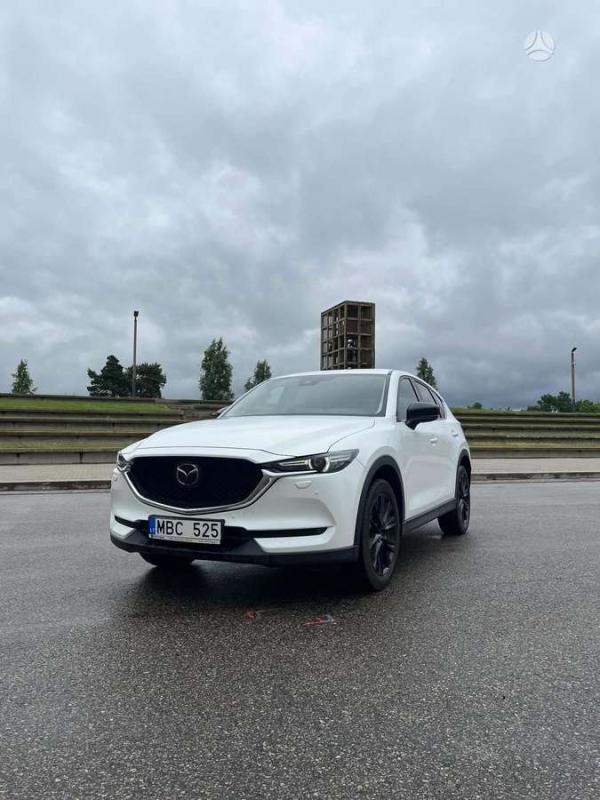 White Mazda CX-5 2021 in Moletai, with an engine capacity of 2.49 L and mileage of 71 thousand km for 24500 €, photo 5 on AUTOMOTO.COM.LV