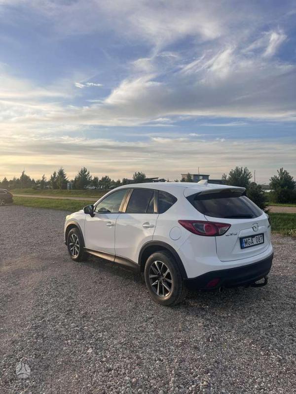 White Mazda CX-5 2012 in Klaipeda, with an engine capacity of 2.20 L and mileage of 220 thousand km for 8900 €, photo 2 on AUTOMOTO.COM.LV