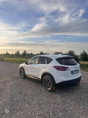 White Mazda CX-5 2012 in Klaipeda, with an engine capacity of 2.20 L and mileage of 220 thousand km for 8900 €, photo 3 on AUTOMOTO.COM.LV