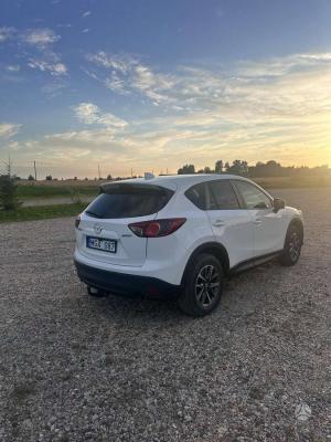 White Mazda CX-5 2012 in Klaipeda, with an engine capacity of 2.20 L and mileage of 220 thousand km for 8900 €, photo 6 on AUTOMOTO.COM.LV