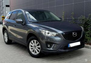 Yellow Mazda CX-5 2013 in Klaipeda, with an engine capacity of 2.19 L and mileage of 297 thousand km for 5700 €, photo 3 on AUTOMOTO.COM.LV