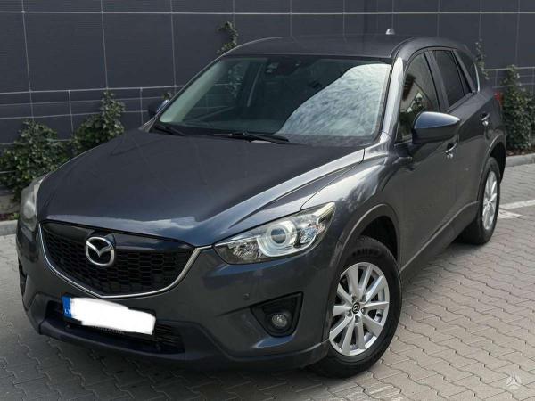 Yellow Mazda CX-5 2013 in Klaipeda, with an engine capacity of 2.19 L and mileage of 297 thousand km for 5700 €, photo 3 on AUTOMOTO.COM.LV