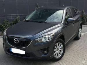Yellow Mazda CX-5 2013 in Klaipeda, with an engine capacity of 2.19 L and mileage of 297 thousand km for 5700 €, photo 4 on AUTOMOTO.COM.LV