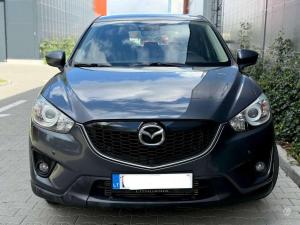 Yellow Mazda CX-5 2013 in Klaipeda, with an engine capacity of 2.19 L and mileage of 297 thousand km for 5700 €, photo 5 on AUTOMOTO.COM.LV