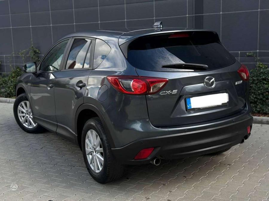 Yellow Mazda CX-5 2013 in Klaipeda, with an engine capacity of 2.19 L and mileage of 297 thousand km for 5700 €, photo 6 on AUTOMOTO.COM.LV