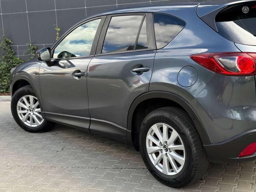 Yellow Mazda CX-5 2013 in Klaipeda, with an engine capacity of 2.19 L and mileage of 297 thousand km for 5700 €, photo 8 on AUTOMOTO.COM.LV