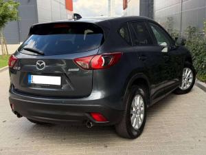 Yellow Mazda CX-5 2013 in Klaipeda, with an engine capacity of 2.19 L and mileage of 297 thousand km for 5700 €, photo 12 on AUTOMOTO.COM.LV