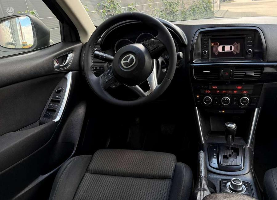 Yellow Mazda CX-5 2013 in Klaipeda, with an engine capacity of 2.19 L and mileage of 297 thousand km for 5700 €, photo 14 on AUTOMOTO.COM.LV