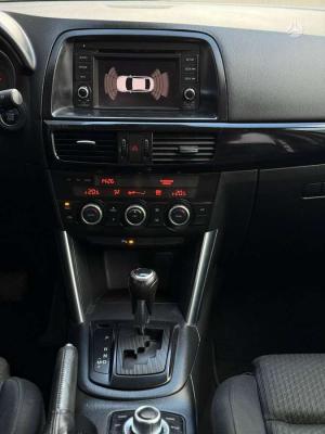 Yellow Mazda CX-5 2013 in Klaipeda, with an engine capacity of 2.19 L and mileage of 297 thousand km for 5700 €, photo 15 on AUTOMOTO.COM.LV