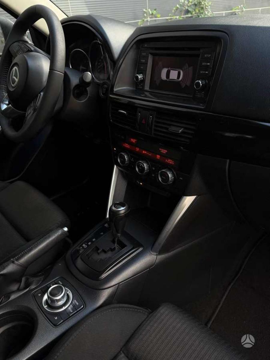 Yellow Mazda CX-5 2013 in Klaipeda, with an engine capacity of 2.19 L and mileage of 297 thousand km for 5700 €, photo 22 on AUTOMOTO.COM.LV