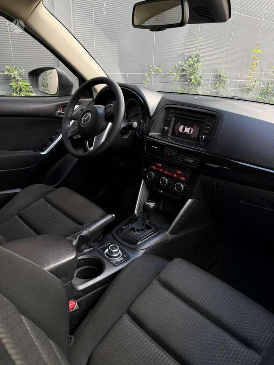 Yellow Mazda CX-5 2013 in Klaipeda, with an engine capacity of 2.19 L and mileage of 297 thousand km for 5700 €, photo 23 on AUTOMOTO.COM.LV
