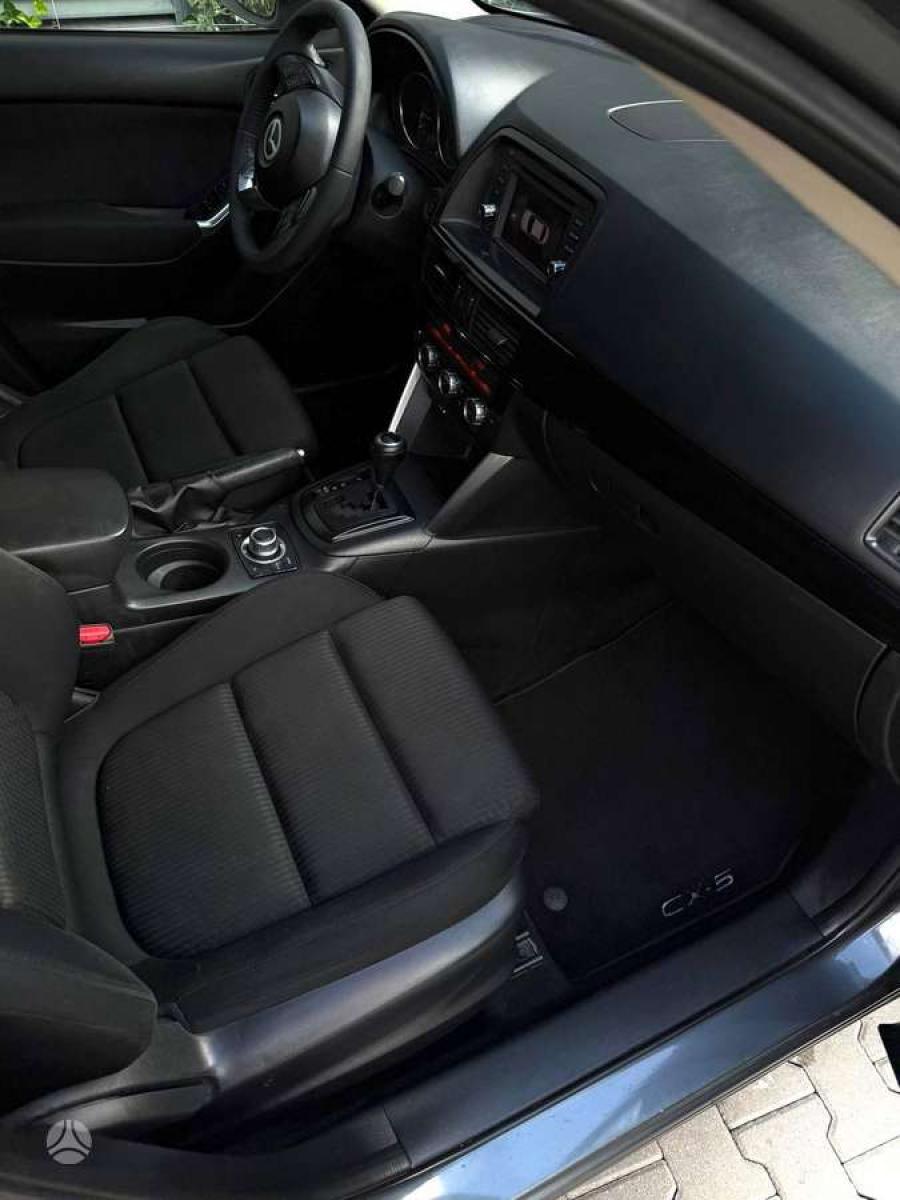 Yellow Mazda CX-5 2013 in Klaipeda, with an engine capacity of 2.19 L and mileage of 297 thousand km for 5700 €, photo 26 on AUTOMOTO.COM.LV