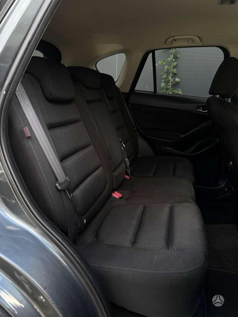 Yellow Mazda CX-5 2013 in Klaipeda, with an engine capacity of 2.19 L and mileage of 297 thousand km for 5700 €, photo 28 on AUTOMOTO.COM.LV