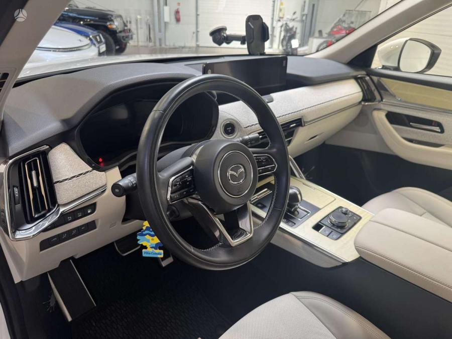 White Mazda CX-60 2025 in Klaipeda, with an engine capacity of 2.49 L and mileage of 12 thousand km for 47000 €, photo 7 on AUTOMOTO.COM.LV
