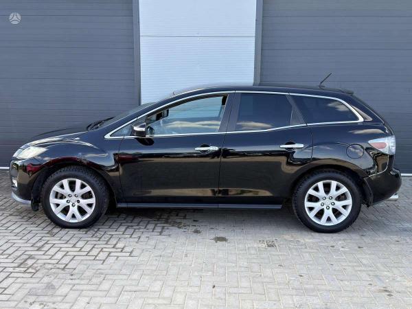 Black Mazda CX-7 2008 in Vilnius, with an engine capacity of 2.26 L and mileage of 395 thousand km for 1600 €, photo 4 on AUTOMOTO.COM.LV