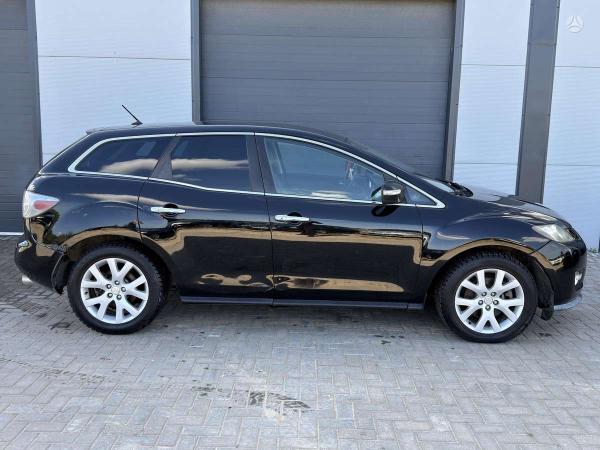 Black Mazda CX-7 2008 in Vilnius, with an engine capacity of 2.26 L and mileage of 395 thousand km for 1600 €, photo 6 on AUTOMOTO.COM.LV