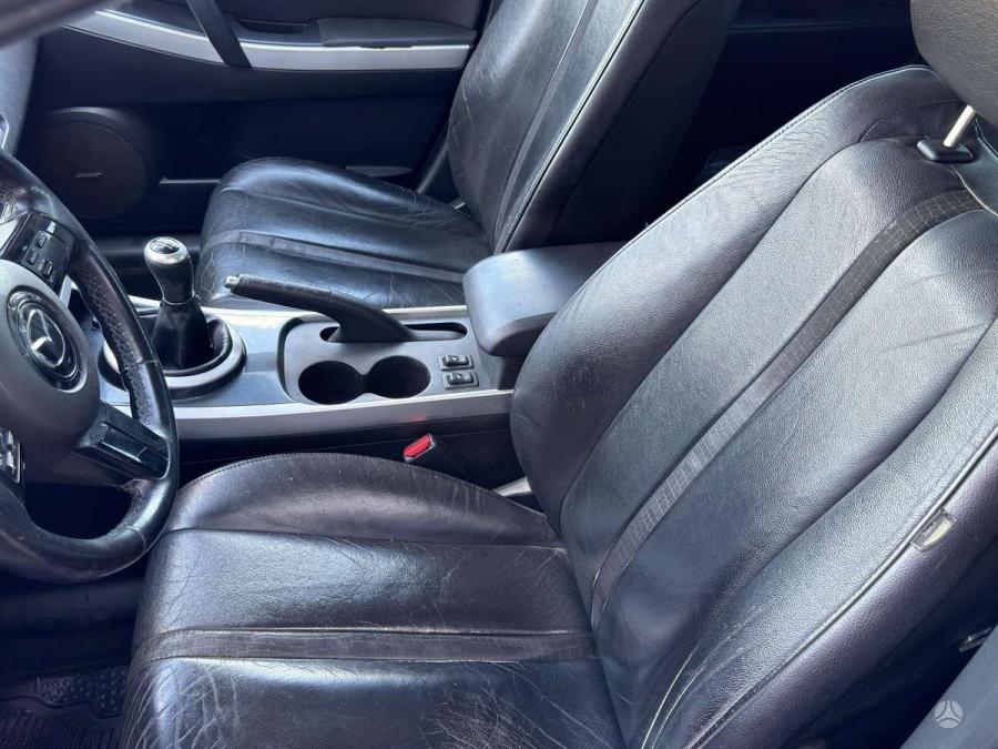 Melns Mazda CX-7 2008 Viļņa, ar dzinēja tilpumu 2.26 L un nobraukumu 395 tūkst. km par 1600 €, foto 15 vietnē AUTOMOTO.COM.LV