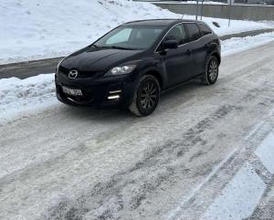 Black Mazda CX-7 2010 in Vilnius, with an engine capacity of 2.49 L and mileage of 135 thousand km for 1700 €, photo  on AUTOMOTO.COM.LV