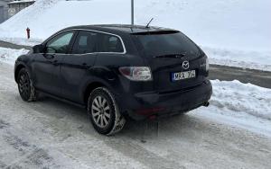 Black Mazda CX-7 2010 in Vilnius, with an engine capacity of 2.49 L and mileage of 135 thousand km for 1700 €, photo 6 on AUTOMOTO.COM.LV