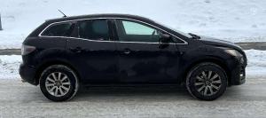 Black Mazda CX-7 2010 in Vilnius, with an engine capacity of 2.49 L and mileage of 135 thousand km for 1700 €, photo 7 on AUTOMOTO.COM.LV